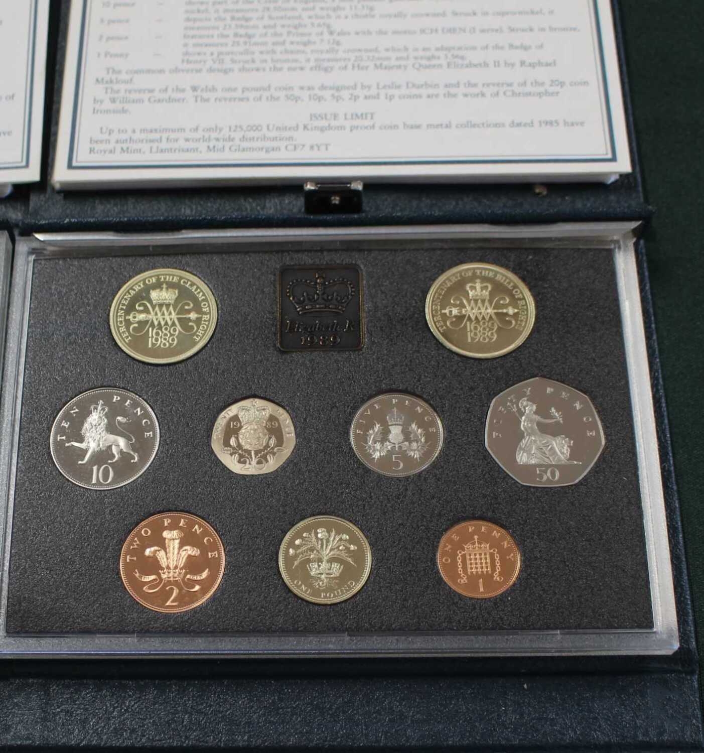 A collection of cased uncirculated proof coin sets in presentation ...