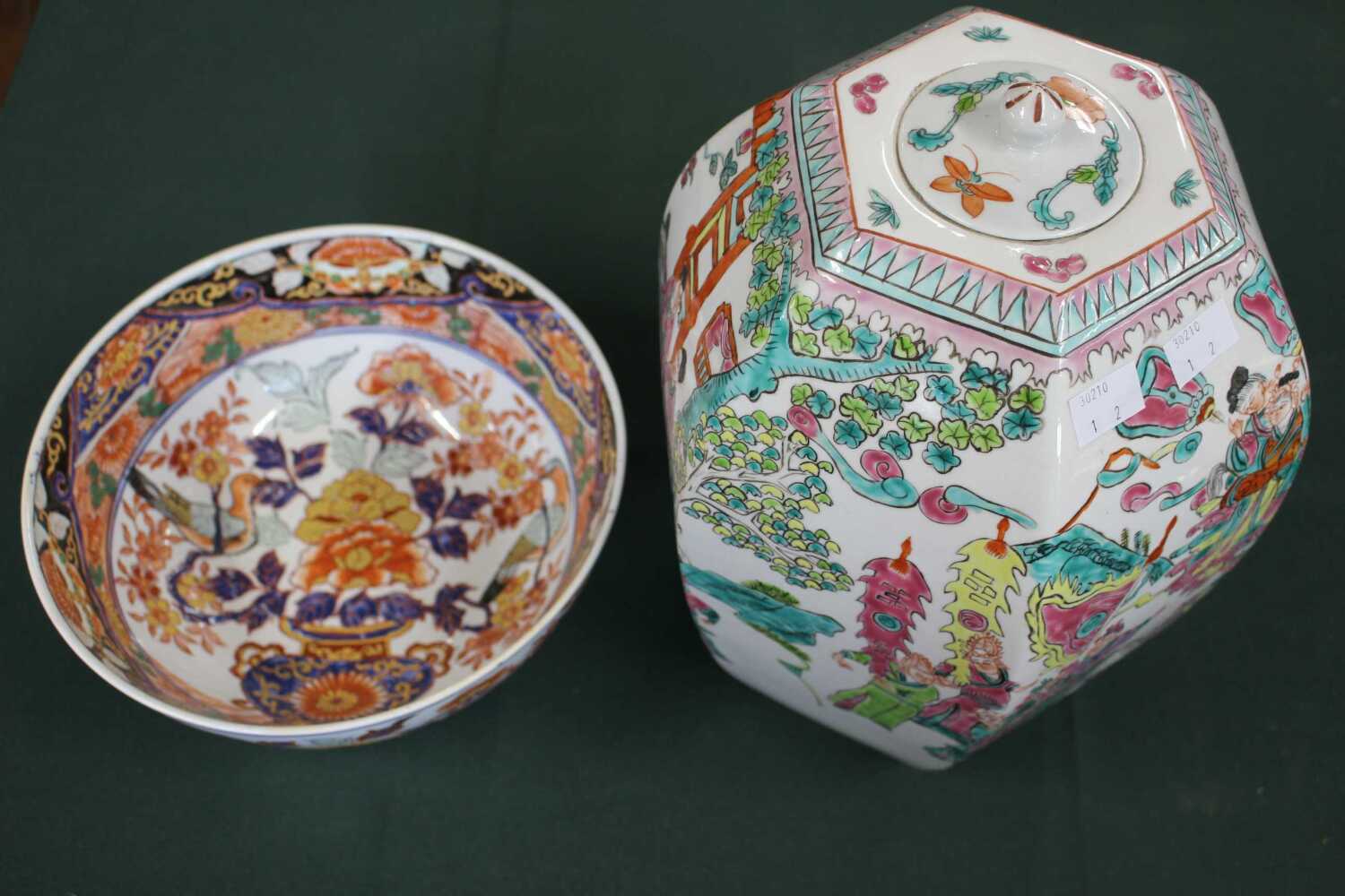 A modern Chinese hexagonal jar and cover painted in famille rose ...