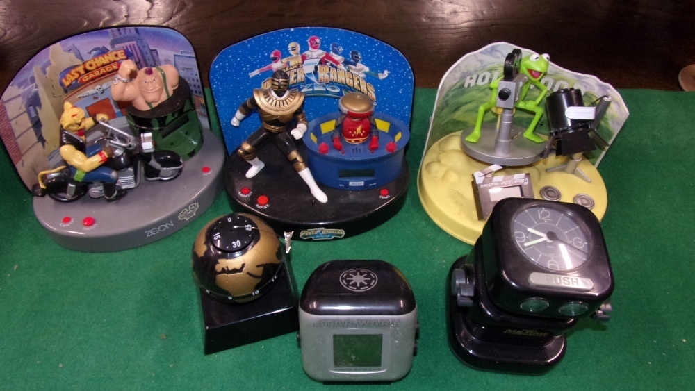 Wallace & Gromit clocks plus other items including a Power Ranger clock.