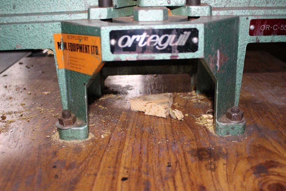 Table mounted MItre cutting machine for picture framing.