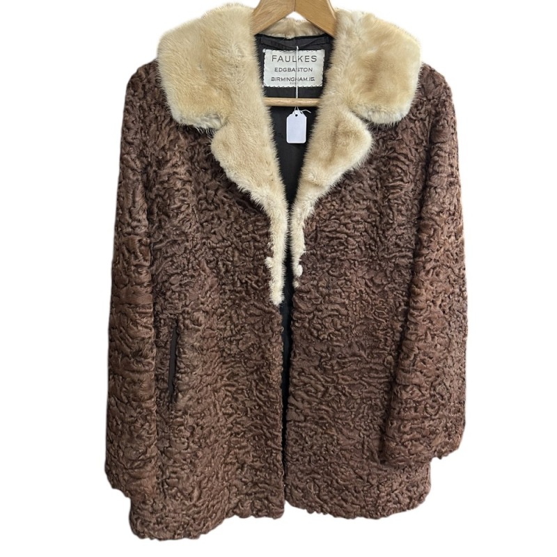 A vintage black wool coat with large fox fur collar, a double breasted ...
