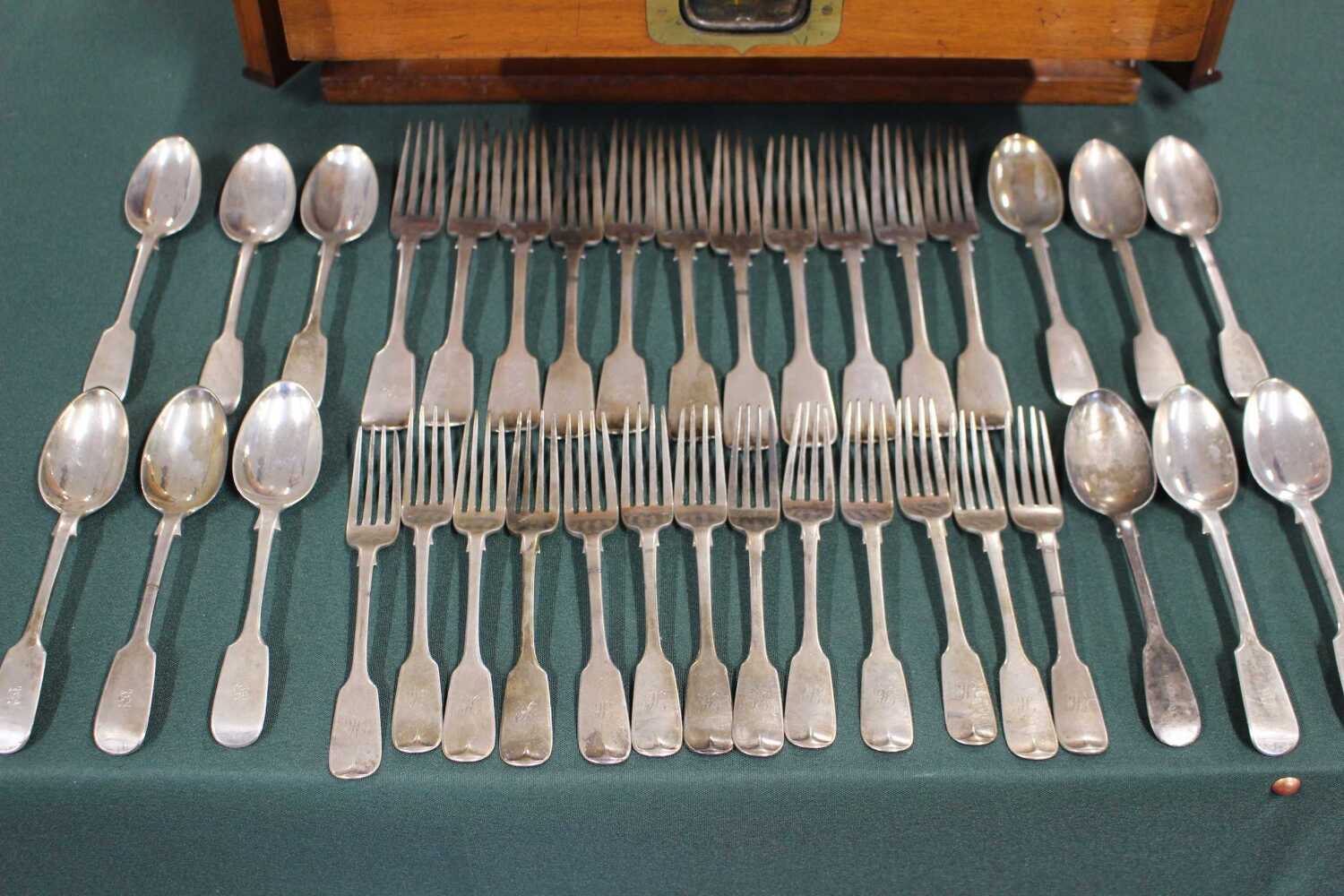 A matched canteen of Victorian silver fiddle pattern cutlery