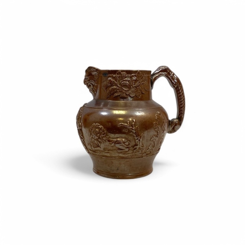 A 19th century salt glazed jug, commemorating the birth of Edward VII ...