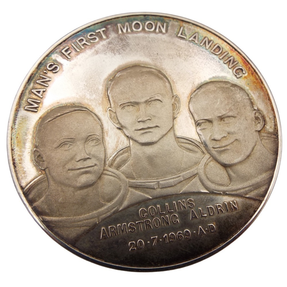 A silver limited edition Man's First Moon Landing Commemorative Medal ...