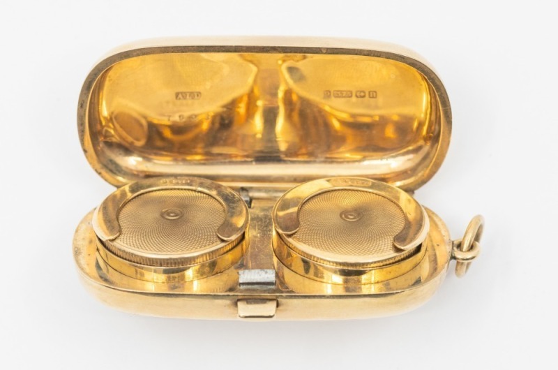 An early 20th century 9ct gold engine turned double sovereign case ...