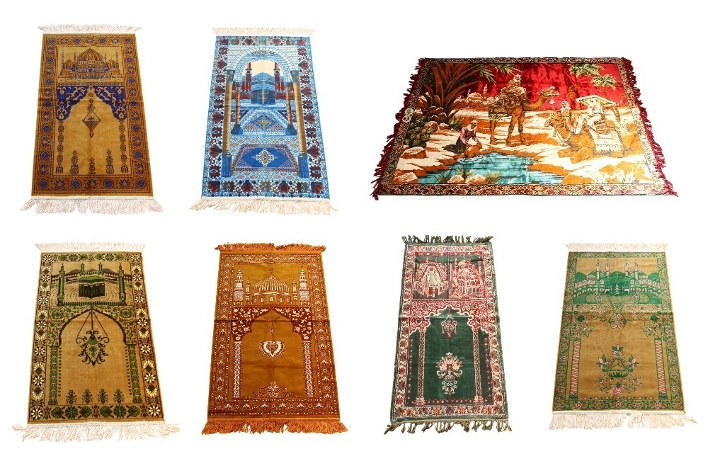 A collection of 20th Century Islamic prayer mats.