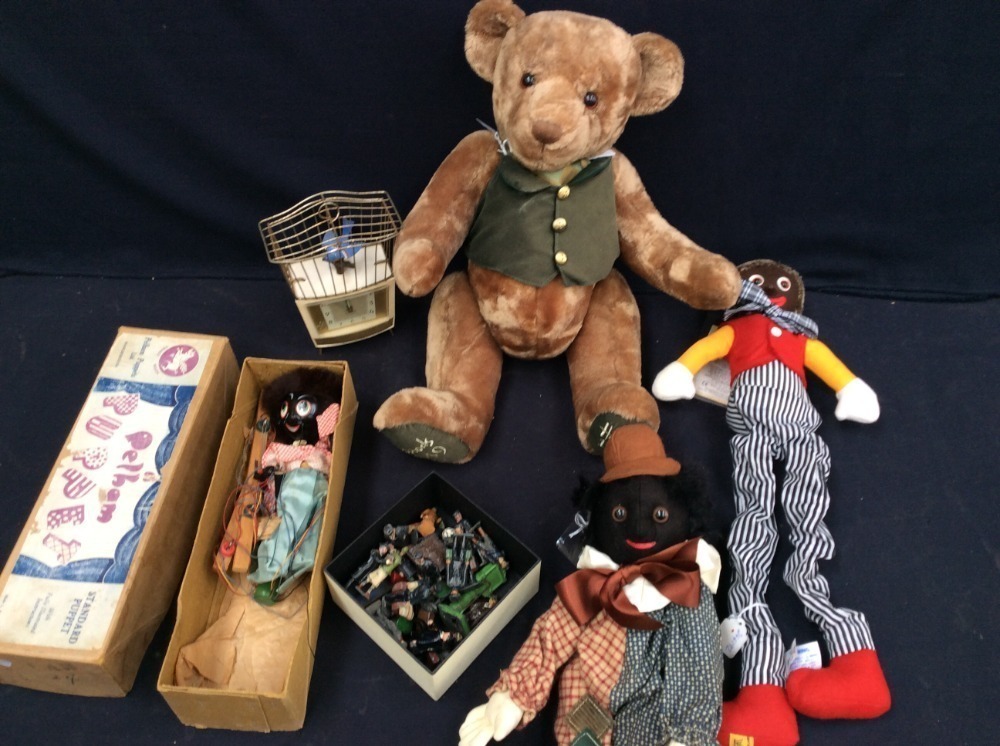 A collection of vintage toys to include a Harrods teddy bear, a Golly ...