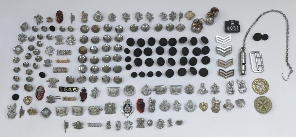 A large selection of British police insignia, many with chromed finish ...