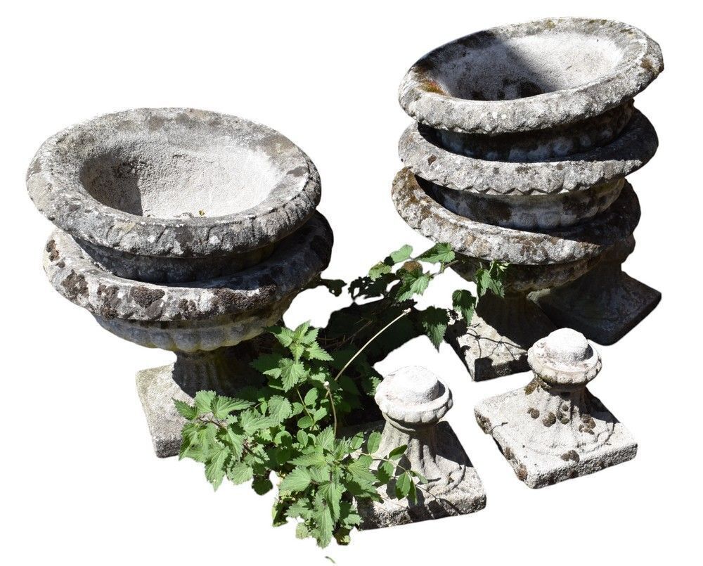 Set of five composite stone Classical style urns, each on separate ...