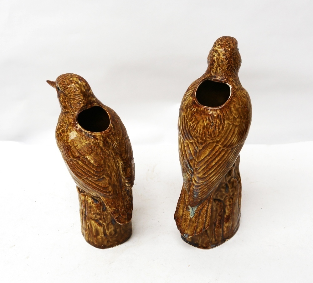Two hand crafted porcelain Penrith pottery birds.