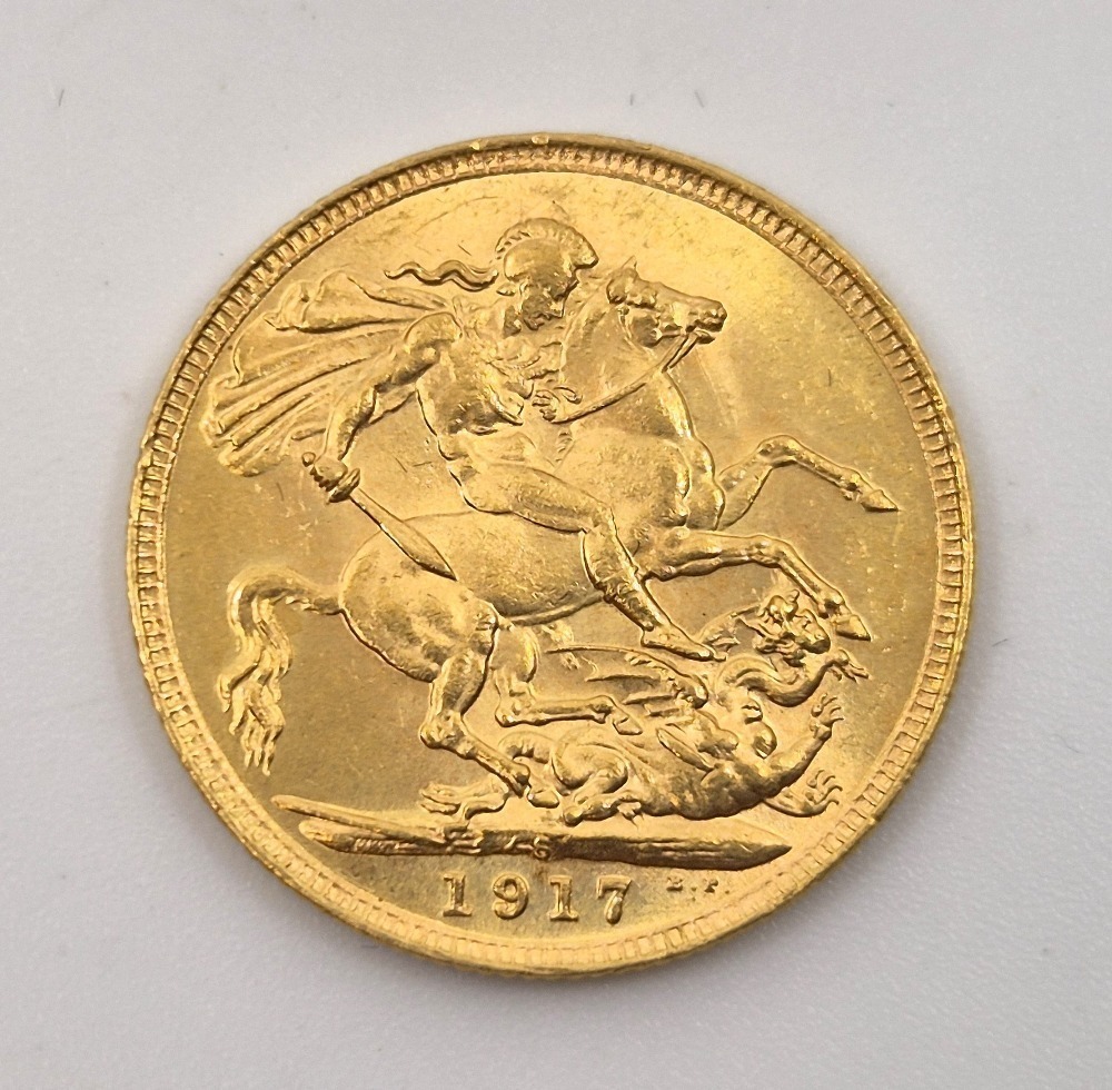 A George V 1917 gold sovereign, Sydney mint, in capsule, M.A.M. 277.