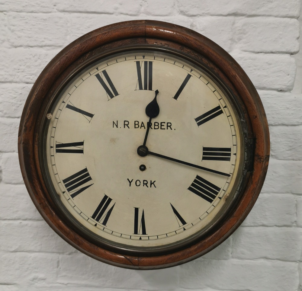 N.R Barber circular railway clock