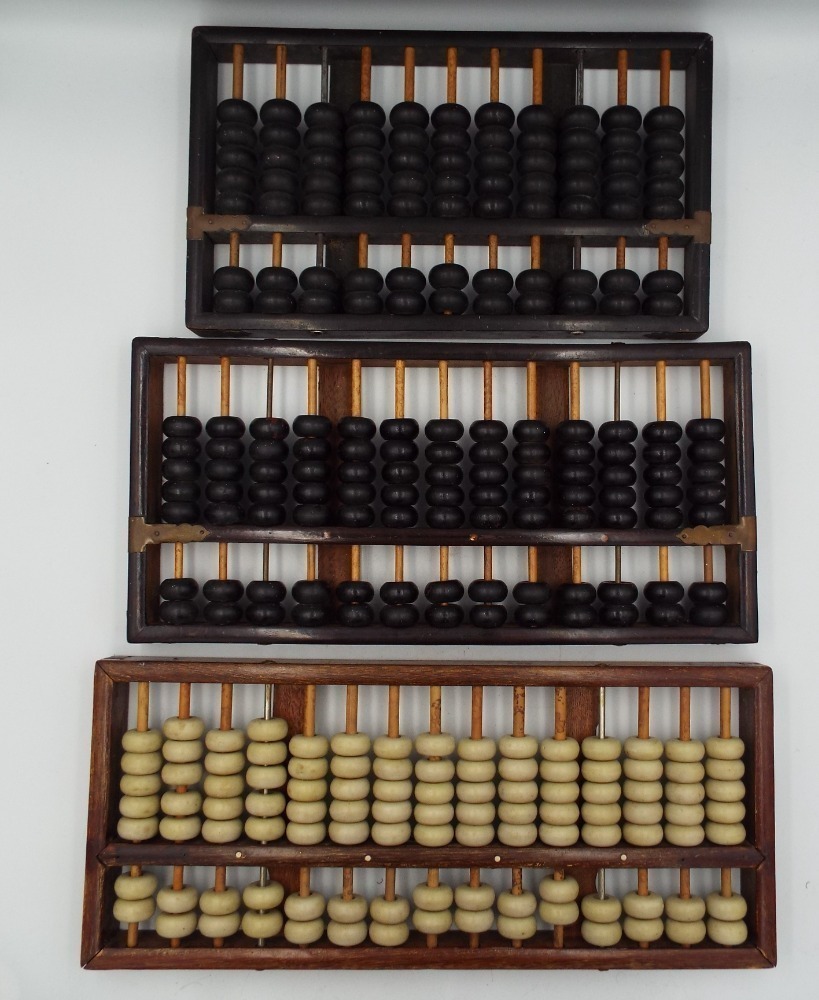 A Chinese hardwood and jade abacus, 20th century, the metal plaque ...