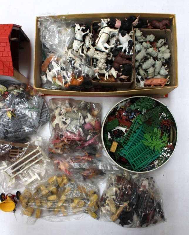 Plastic Figures: A collection of assorted plastic farm animals and ...