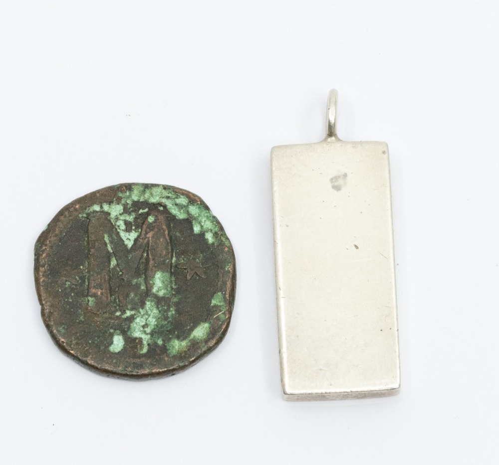 A silver ingot, hallmarked Sheffield 1977 and a Byzantine Anastasius 40 ...