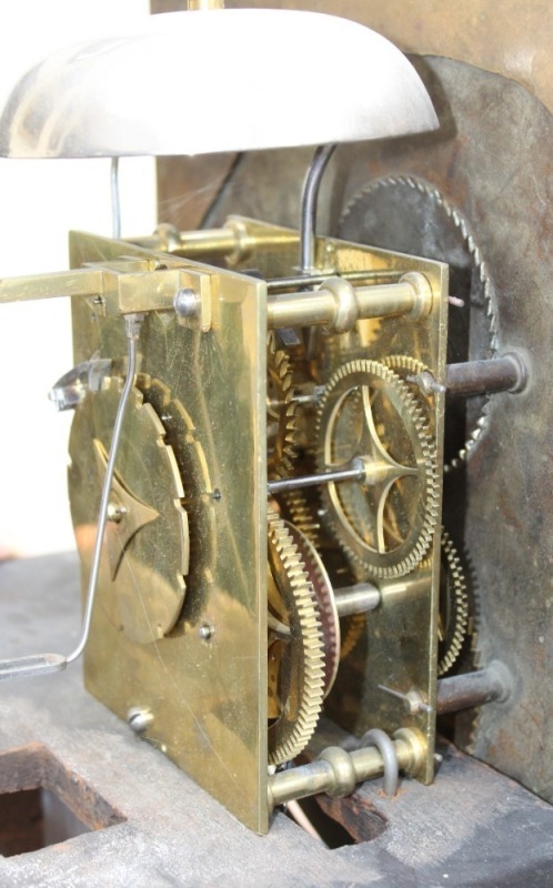 A carved oak longcase clock in 18th century style, having a thirty hour ...