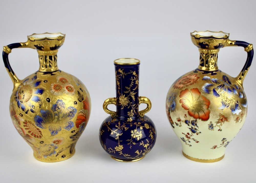 Two Royal Crown Derby Imari style jugs, together with a Minton vase ...