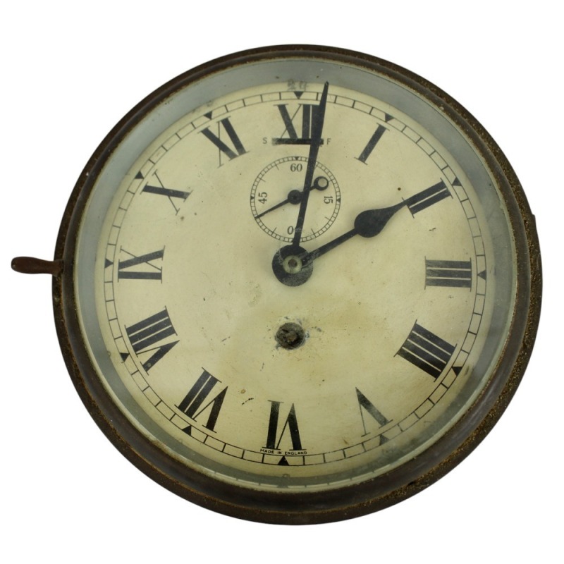 A brass ship's bulkhead timepiece, 19cm in diameter, together with a ...