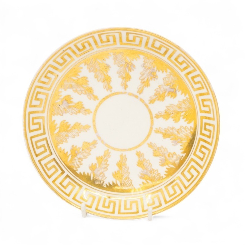 A Pinxton porcelain straight sided trio, teacup, coffee can and saucer ...