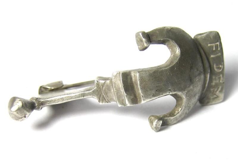 Roman silver brooch A silver brooch of unknown age in the style of an ...