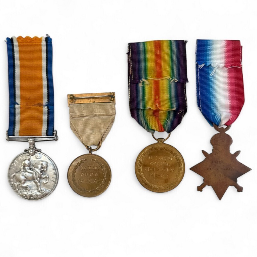 Four assorted WWI medals to include 1914-15 Star named (22321 Pte.J ...
