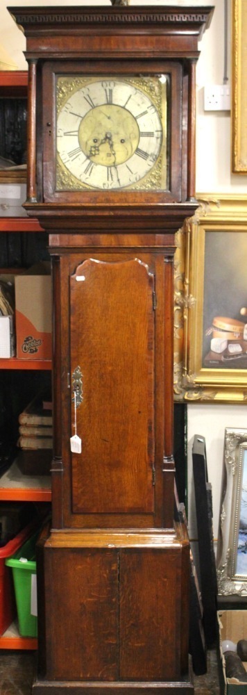 A George III oak longcase clock, the brass dial with seconds hand and ...