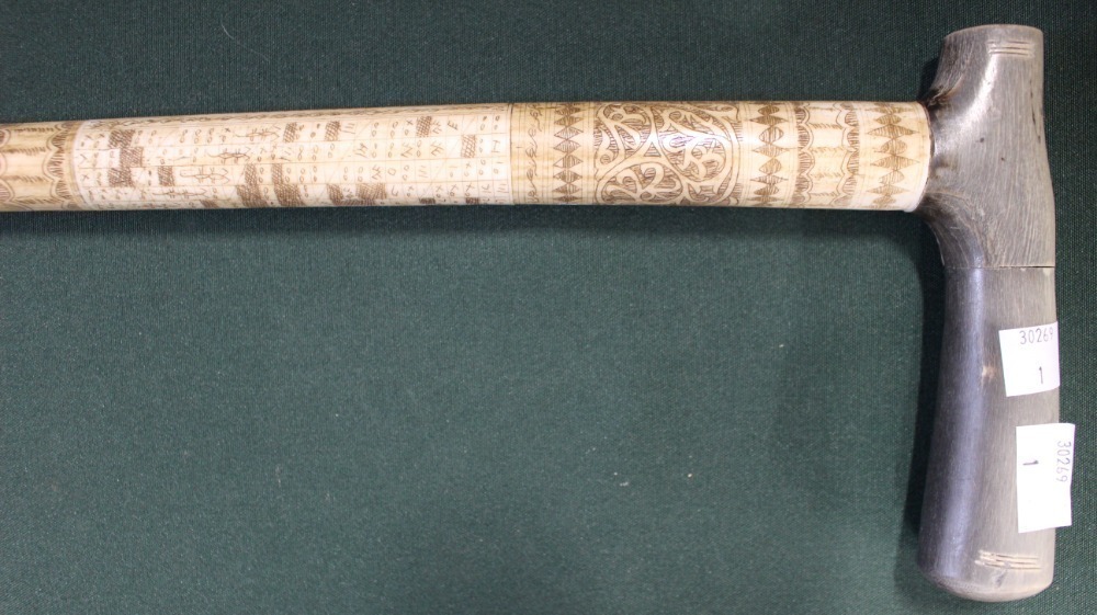 An unusual Polynesian bone walking stick of sectional construction with ...