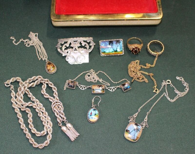 A 9ct gold cluster ring with ruby coloured stones, a Thomas Mott ...