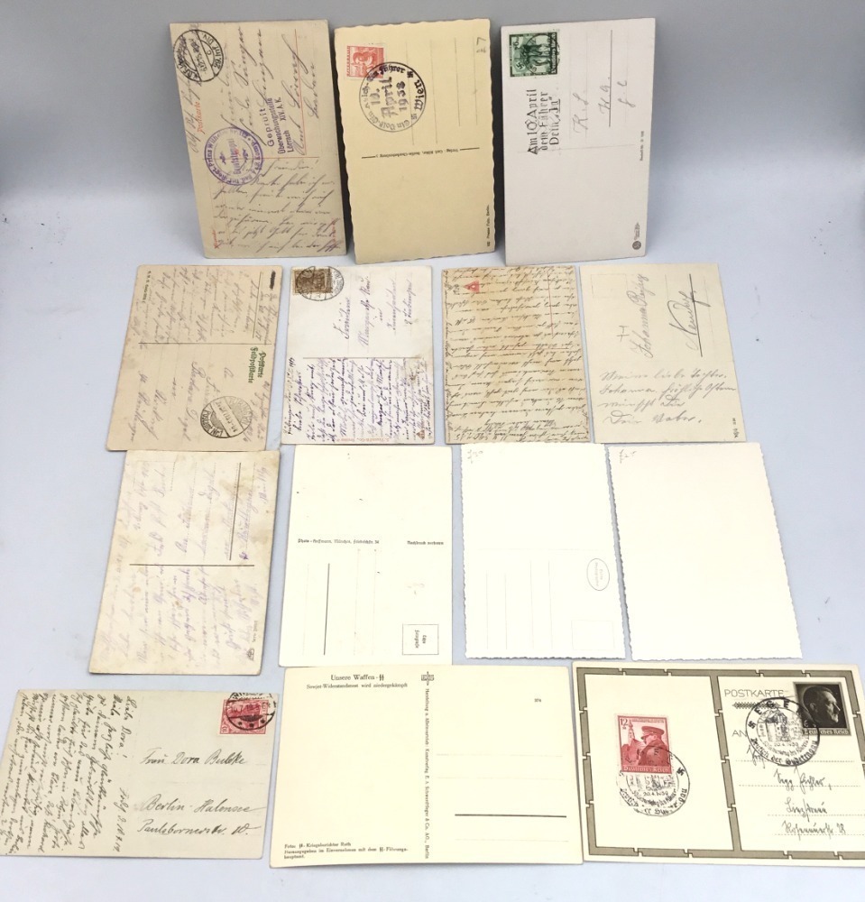 A good selection of WW1 and WW2 German postcards, and studio portrait ...
