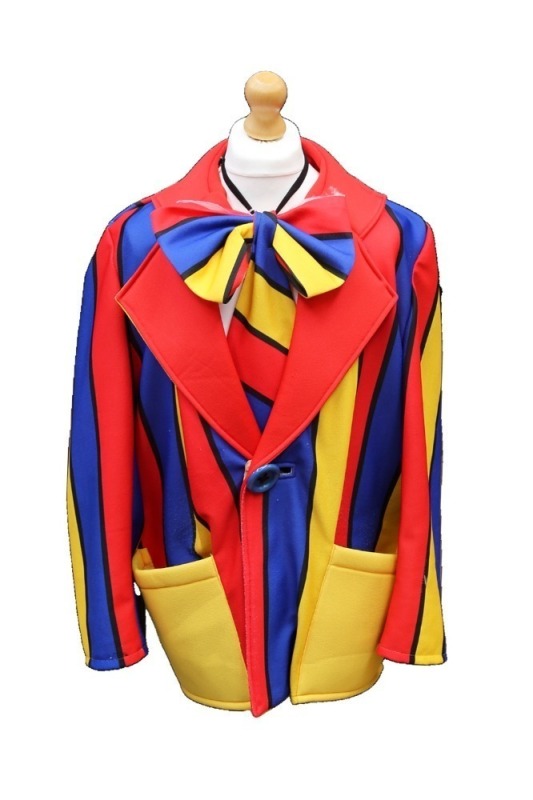 An interesting clown's outfit in a bright colourway of red, blue and ...