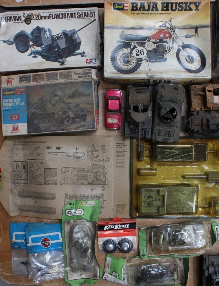 One box of assorted model kits and vehicles, some examples are built ...