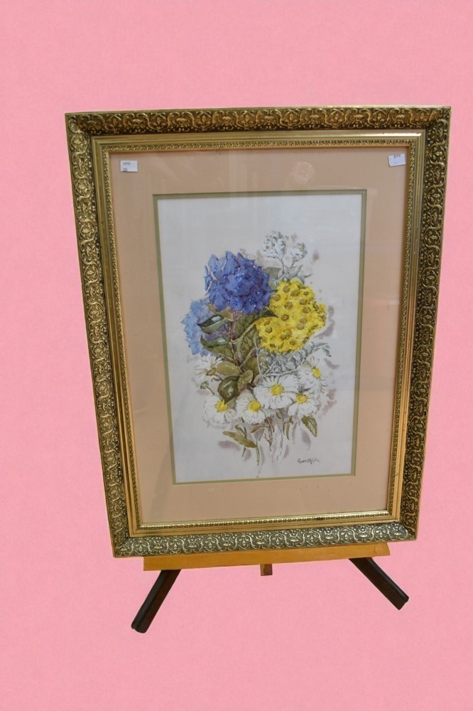 A small group of frames, mainly framed and glazed prints but also ...
