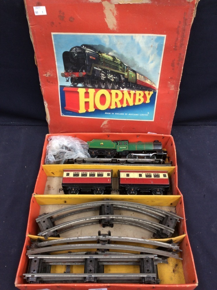 A boxed Hornby/Meccano Ltd O Gauge train set, c1960 loco, carriages and ...