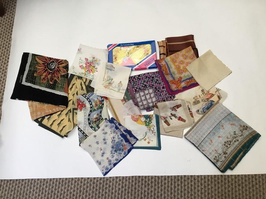 A collection of scarves to include: a Biba silk scarf depicting ...