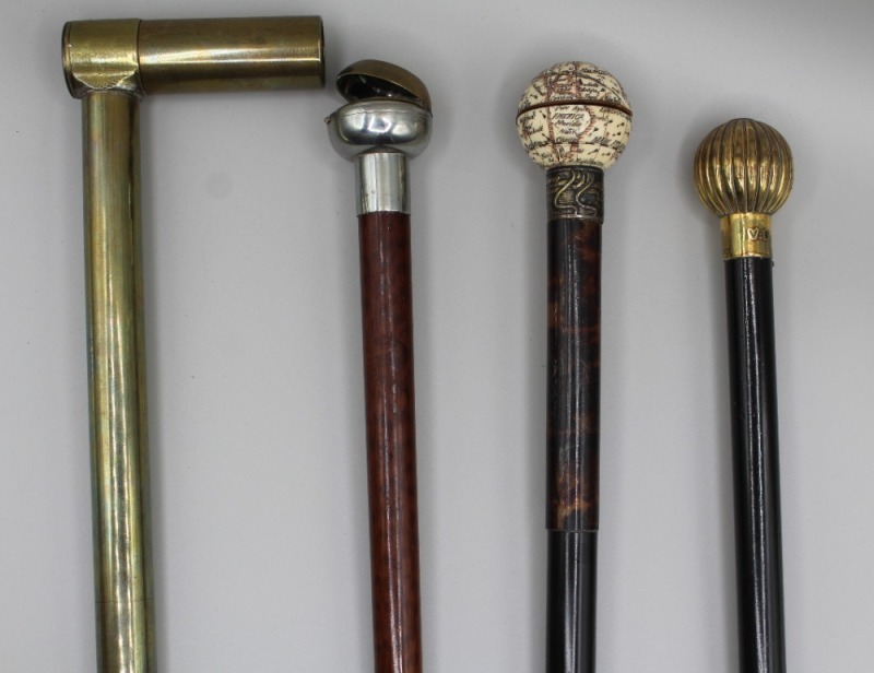 An unusual brass handled Malacca combined periscope/telescope walking ...