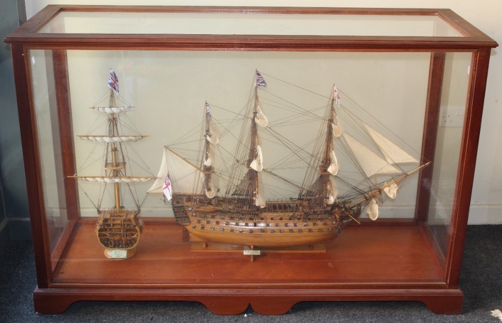 A large kit built model of HMS Victory in glazed display case. 100 x ...
