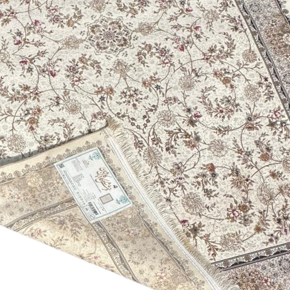 A machine-made 'Kashan Shahkar Dorrin Carpet', with label, the ivory ...