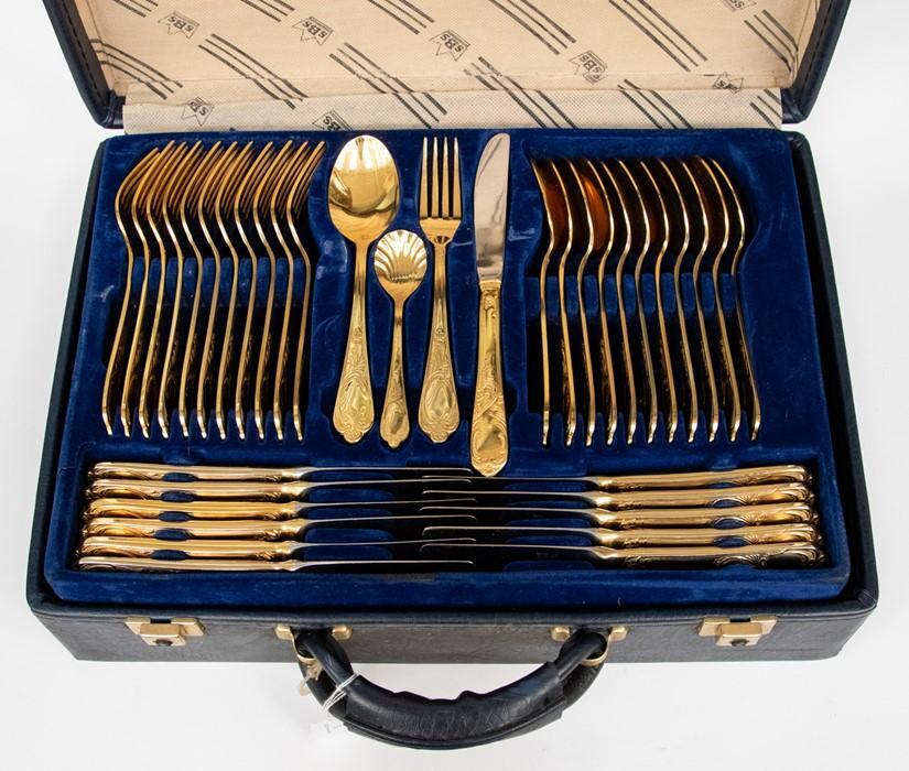 A Bestecke Solingen canteen of cutlery, gold plated and stainless steel ...