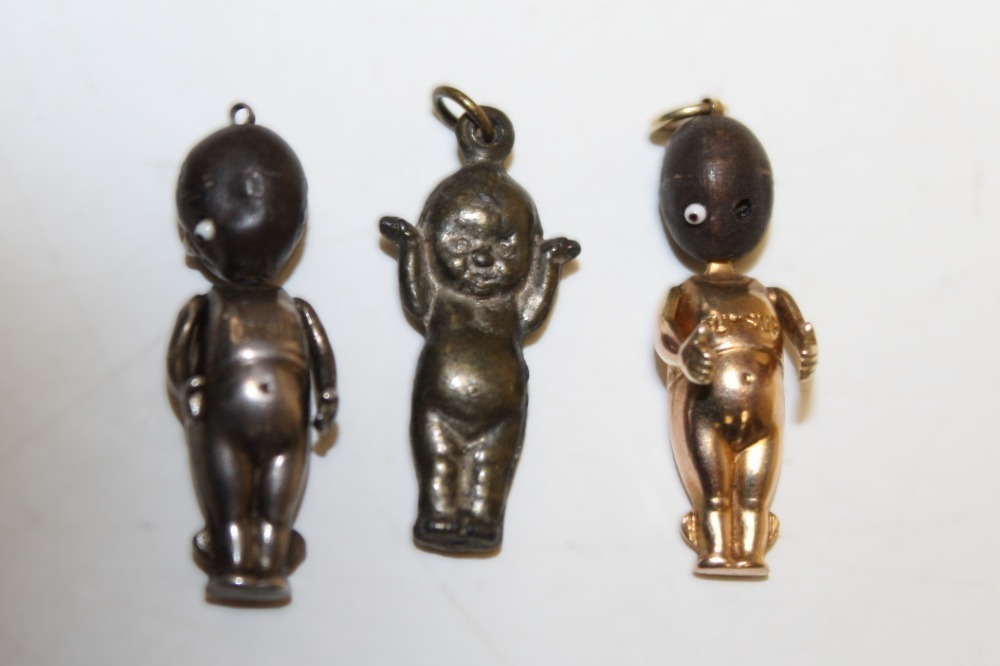 A First World War 9ct gold Touchwood Thumbsup good luck charm together ...