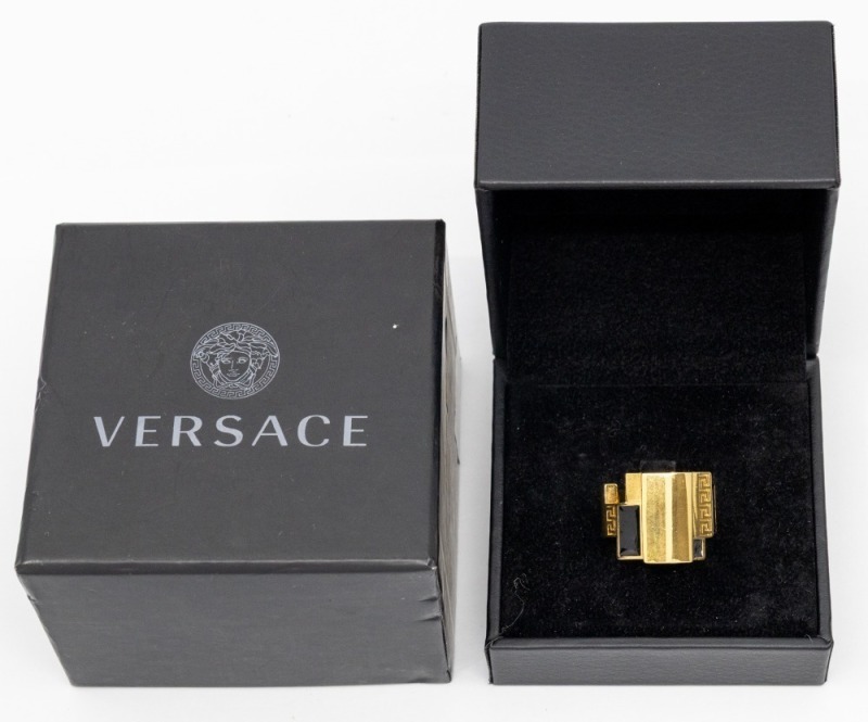 Versace- a brass and black inlaid dress ring, Greek key design, with ...