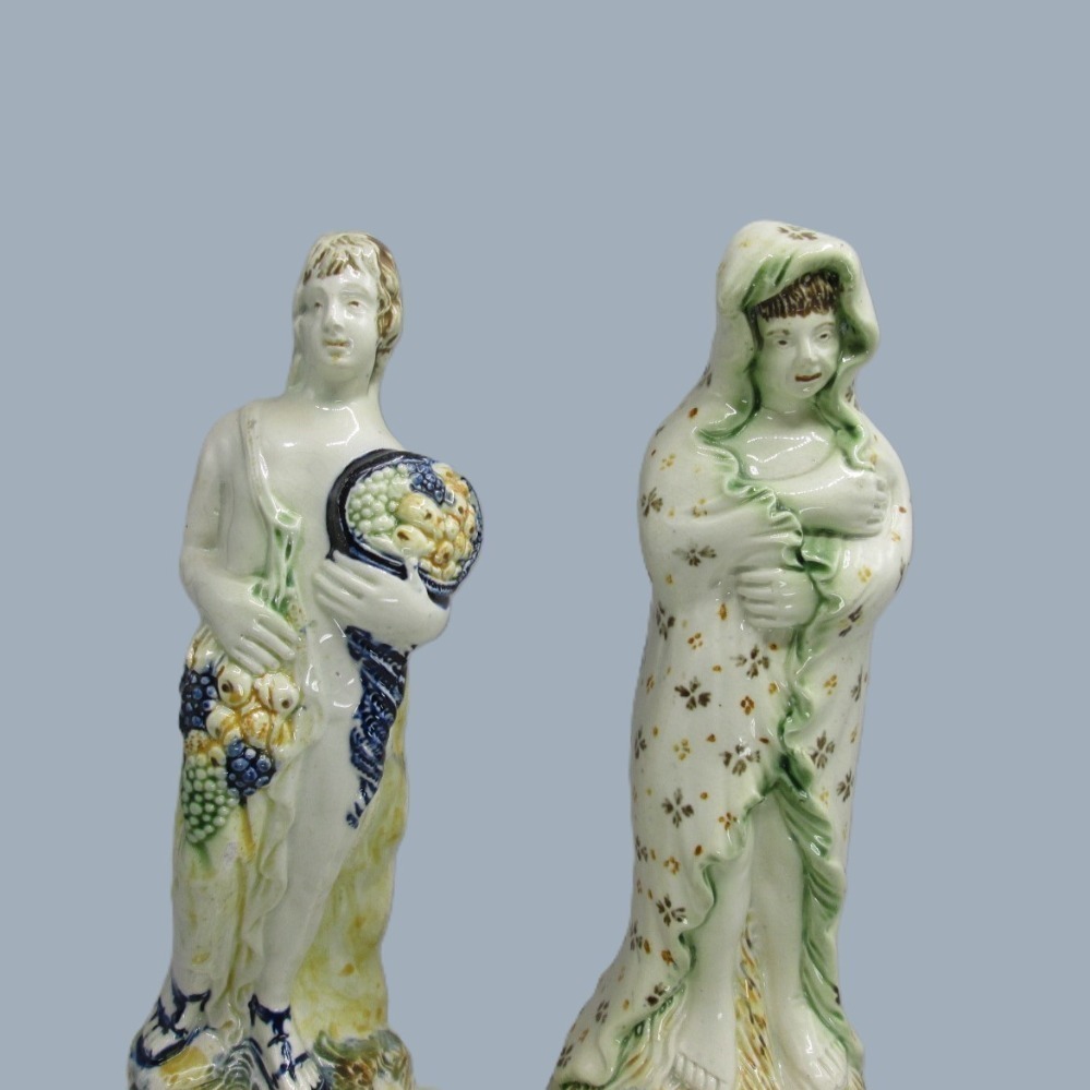Two Prattware figures of Summer and Winter, from the set of four ...