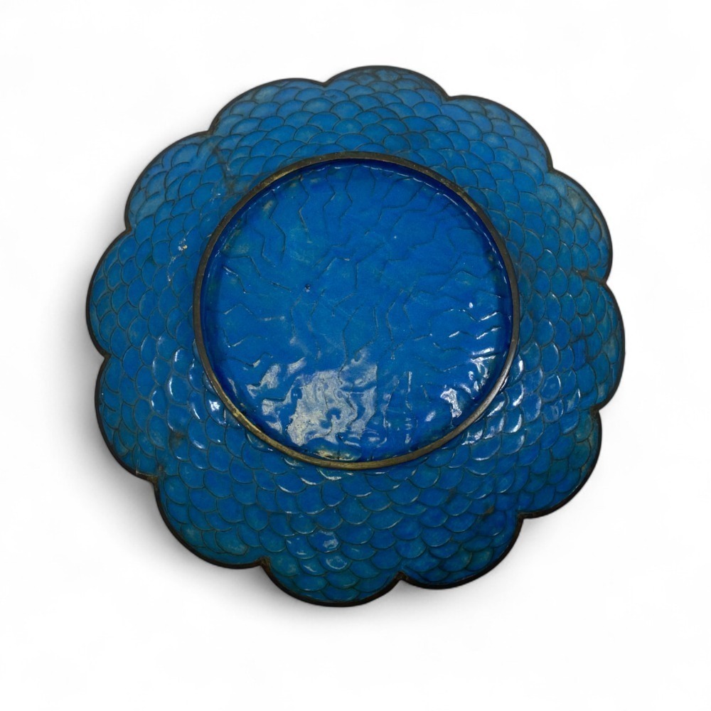 A Meiji period Japanese Cloisonne plate, with a scalloped rim, centered ...