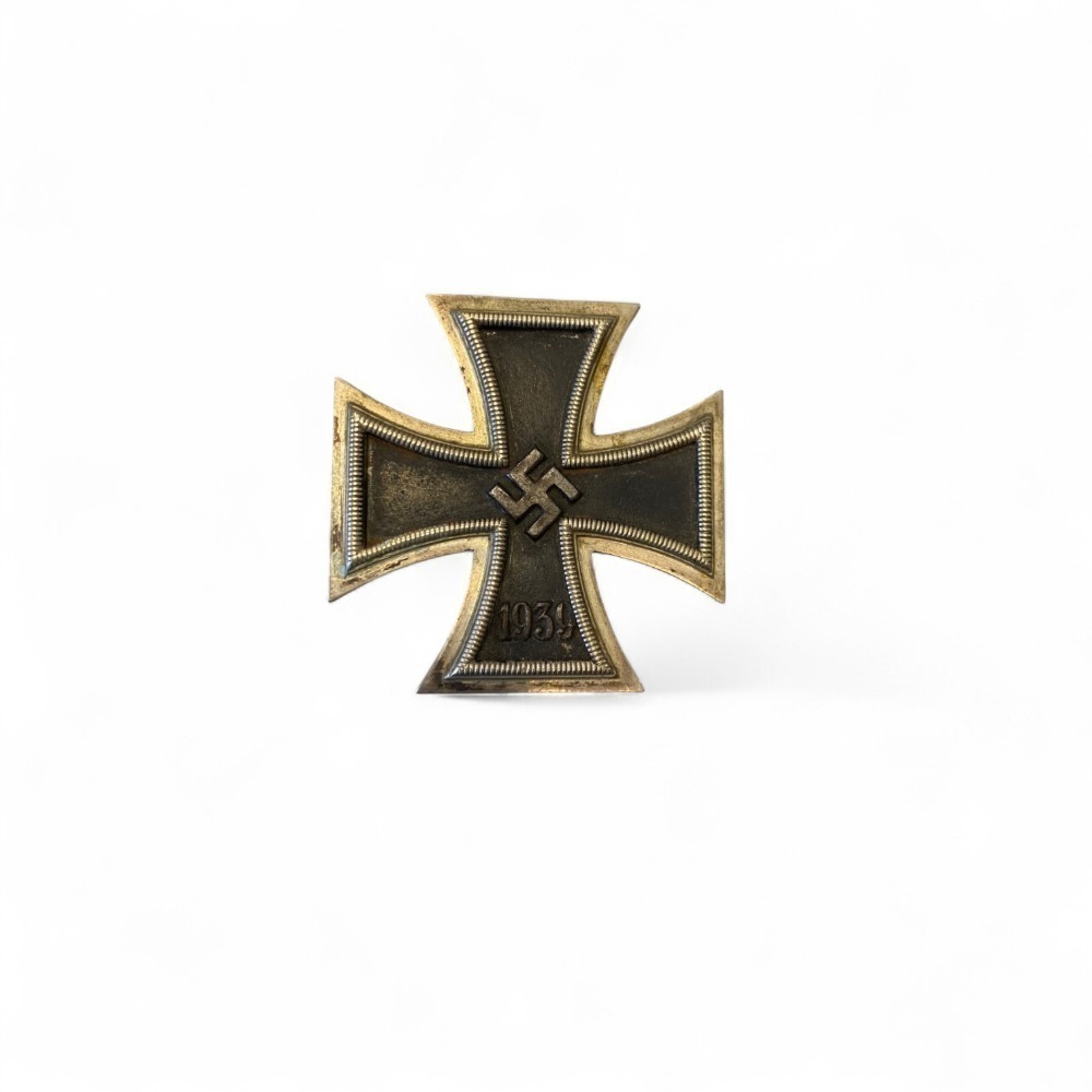 WWII The German Cross in Gold badge and a 1939 Iron Cross badge marked ...