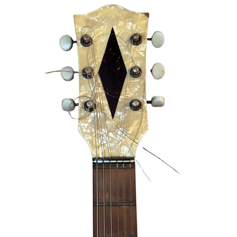 A Hofner 455 Sunburst guitar, 105 x 41cm and including a photo of the ...