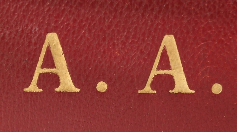 A vintage Drew & Sons of Picadilly Circus red suitcase, with brass ...