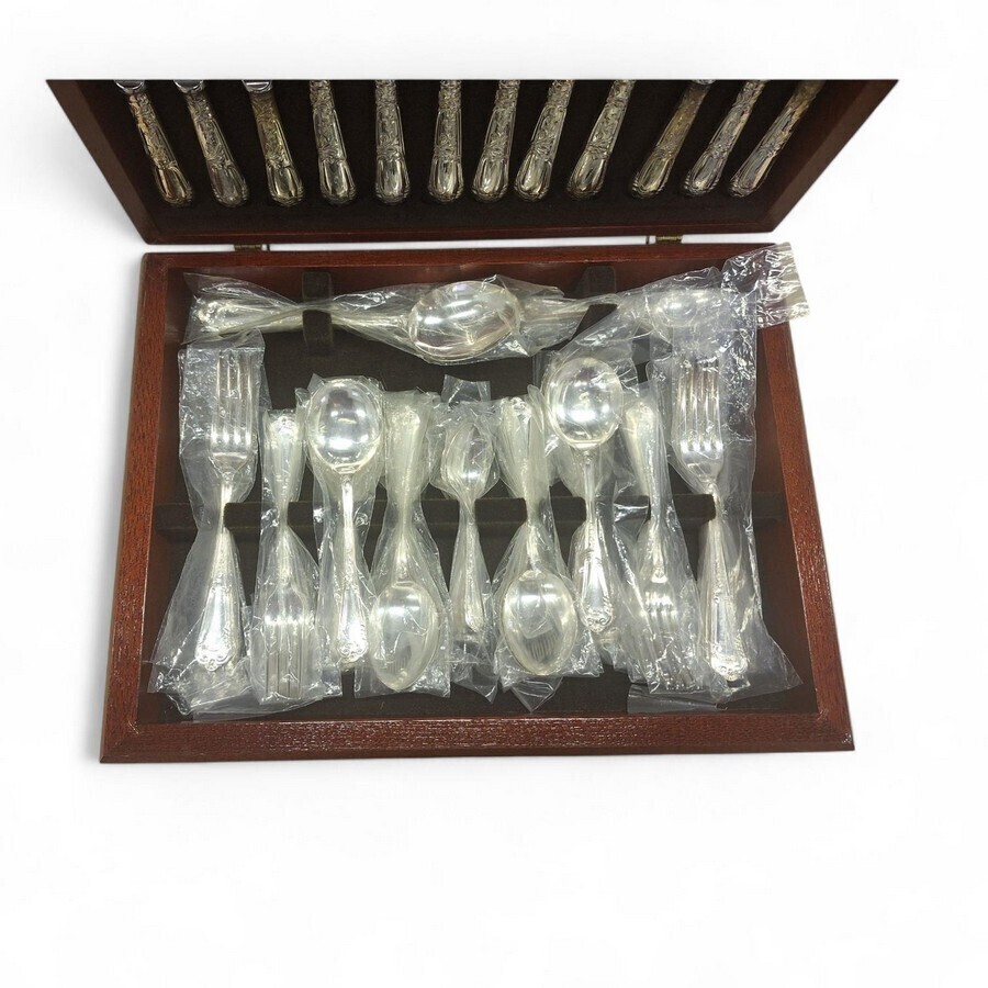 A six place canteen of electro plate nickel silver cutlery in a wooden ...