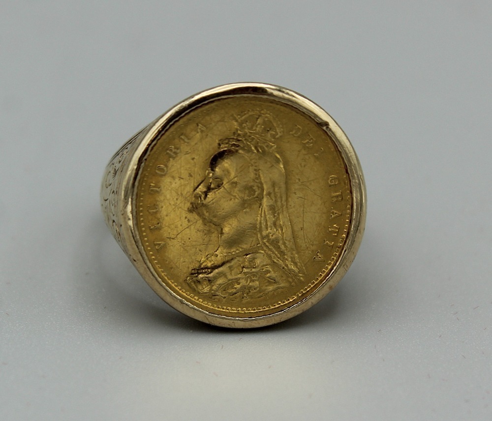An 1887 Victorian shield back half sovereign. Mounted as a ring, set in ...