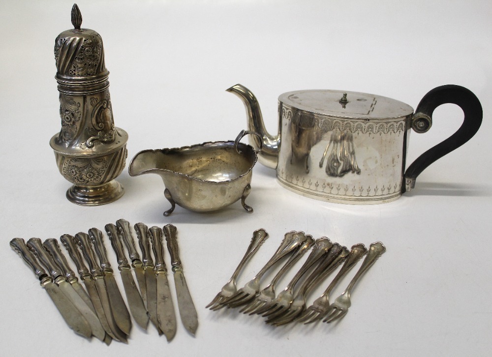 A Victorian silver sugar castor with floral chasing and gadrooning ...