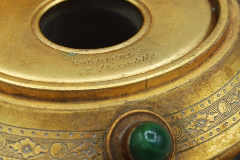 Rodrigues, Piccadilly. A brass and malachite Neo- Classical form inkstand, raised on a ...