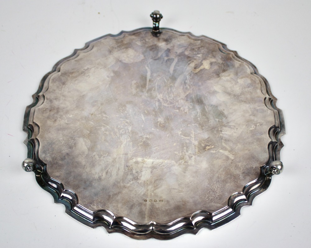 A good silver salver of circular form, with engraved central ...